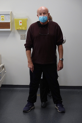 "Pull test front view (stability test when evaluating for parkinsonism ...