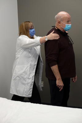 "Pull test side view (stability test when evaluating for parkinsonism ...