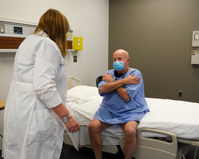 "Movement disorder examination for parkinsonism: standing from bed with ...